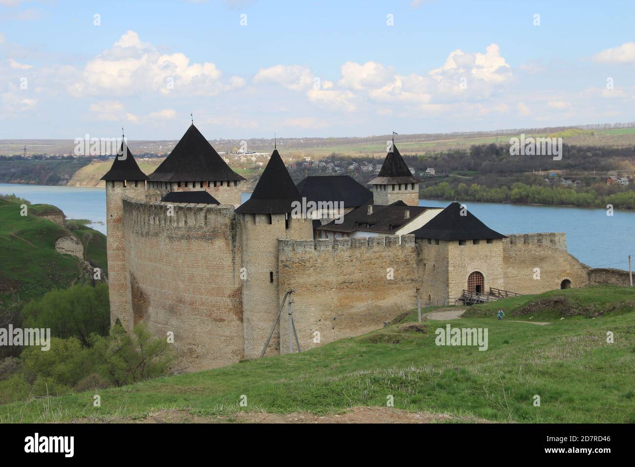 an old stone castle in a green field Stock Photo - Alamy