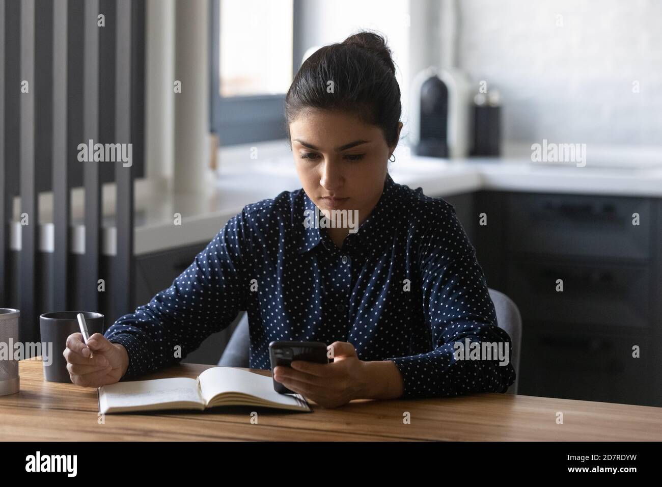 Business people using notebook hi-res stock photography and images - Alamy