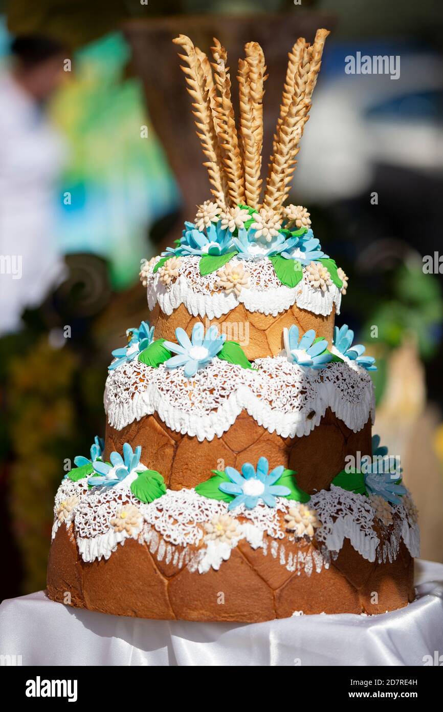 Yeast three-layer Russian loaf decorated with flowers. Beautiful ...