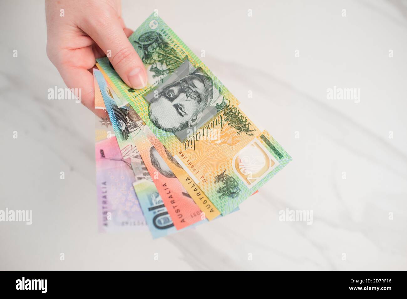 Australian dollar banknotes in the hands. on the white background Stock ...