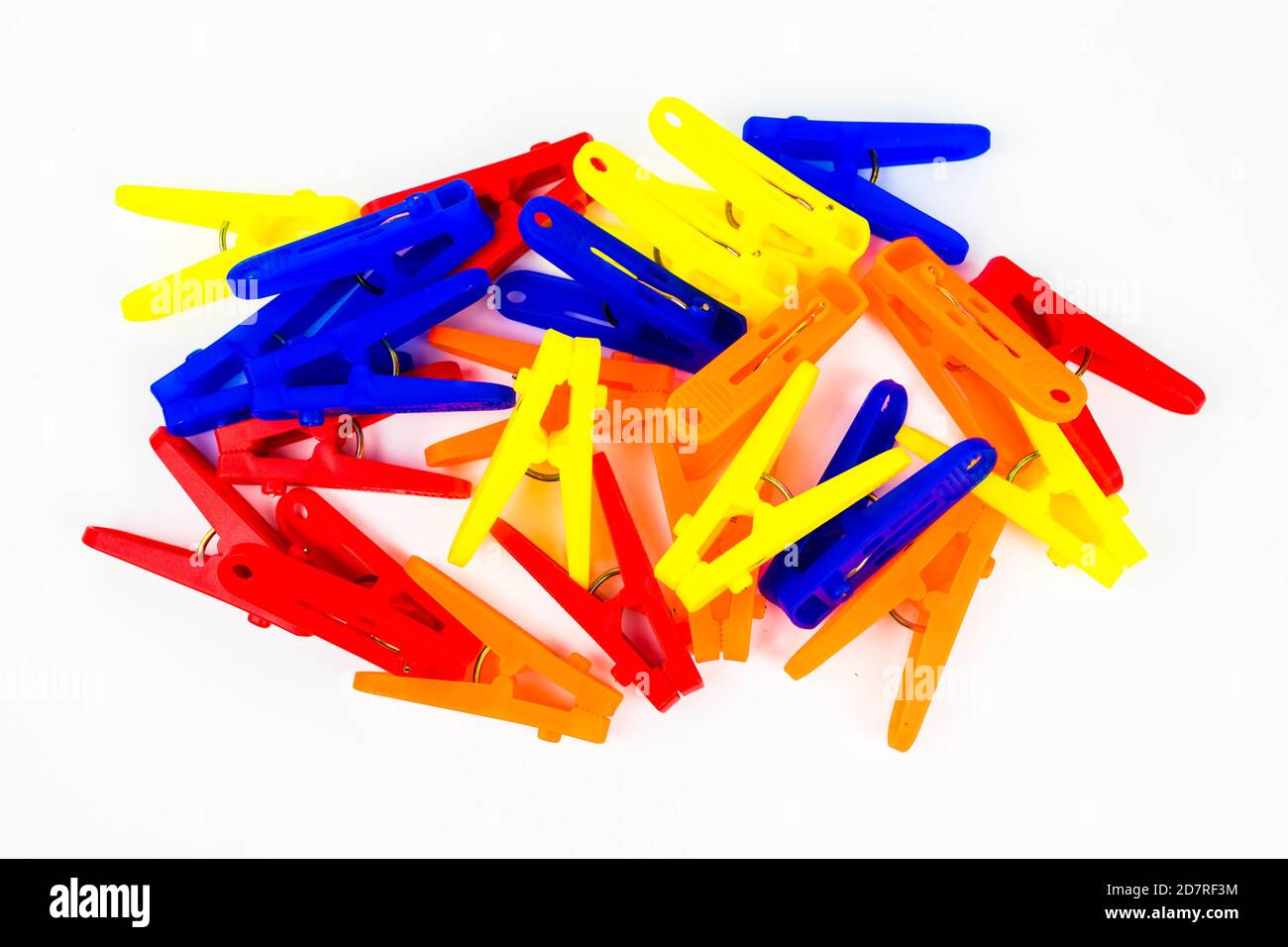 Colorful clothespins for kids on a white background Stock Photo - Alamy