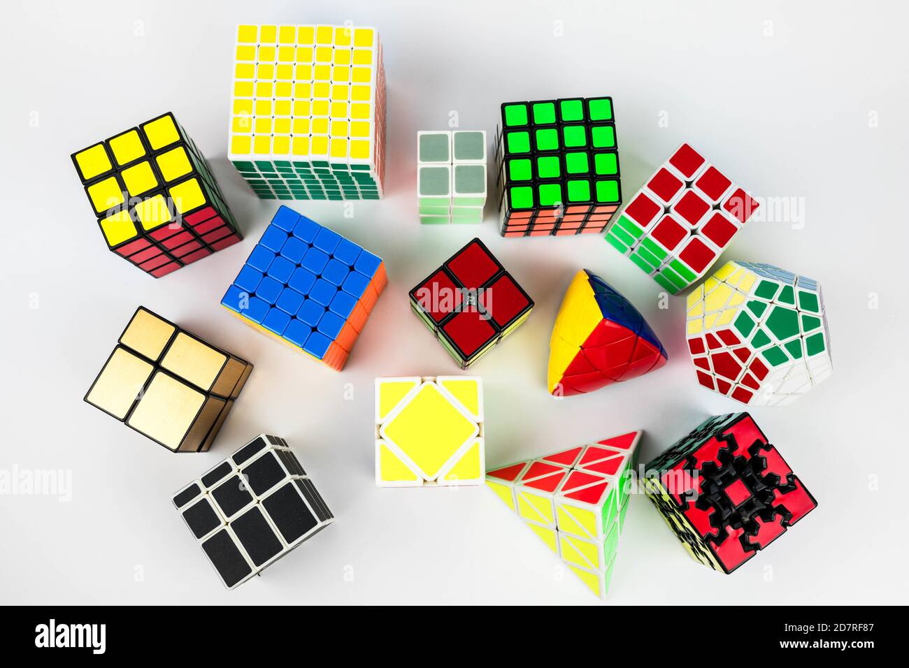 Colorful Rubik's cubes over white background Stock Photo - Alamy