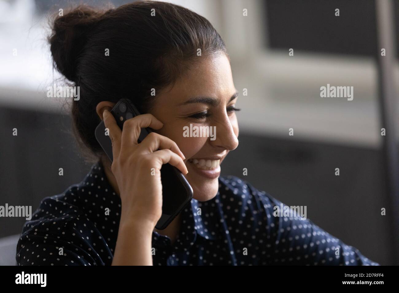 Smiling Indian woman have pleasant cellphone call Stock Photo - Alamy