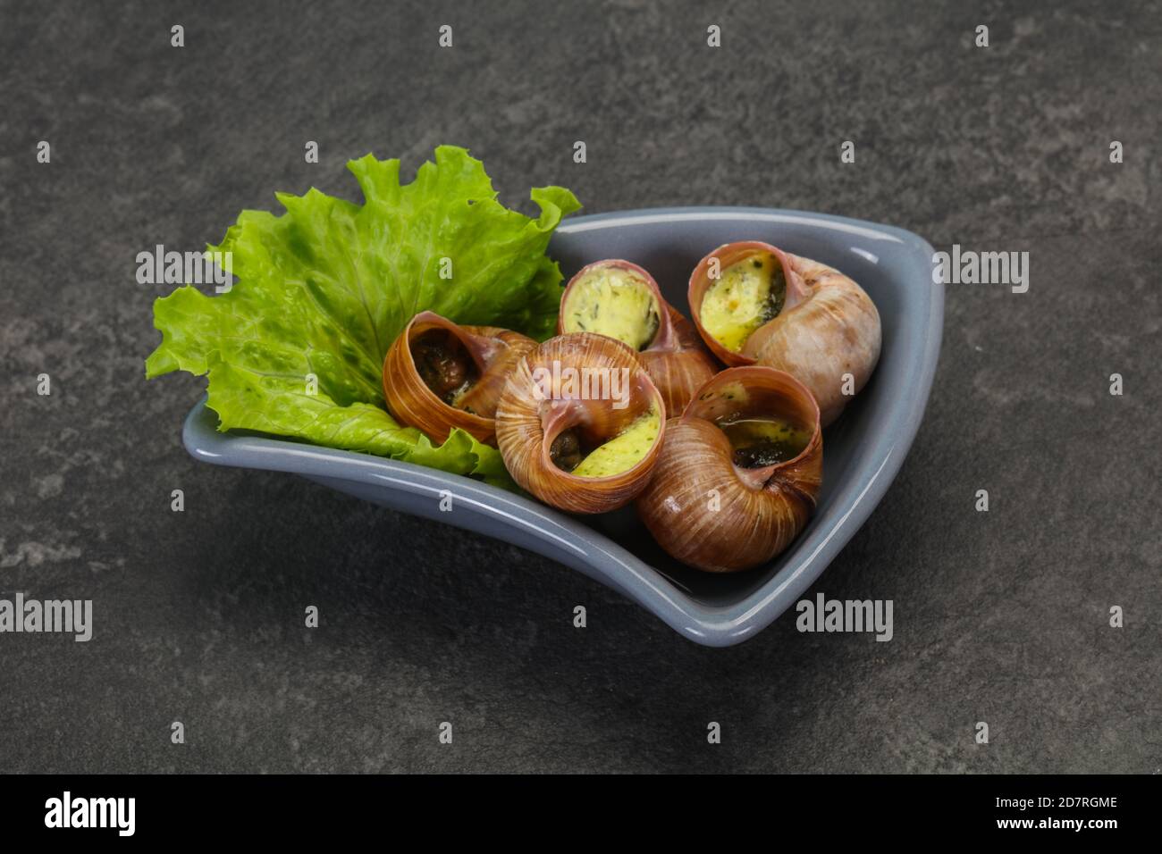 French cuisine - Escargot with butter sauce Stock Photo - Alamy