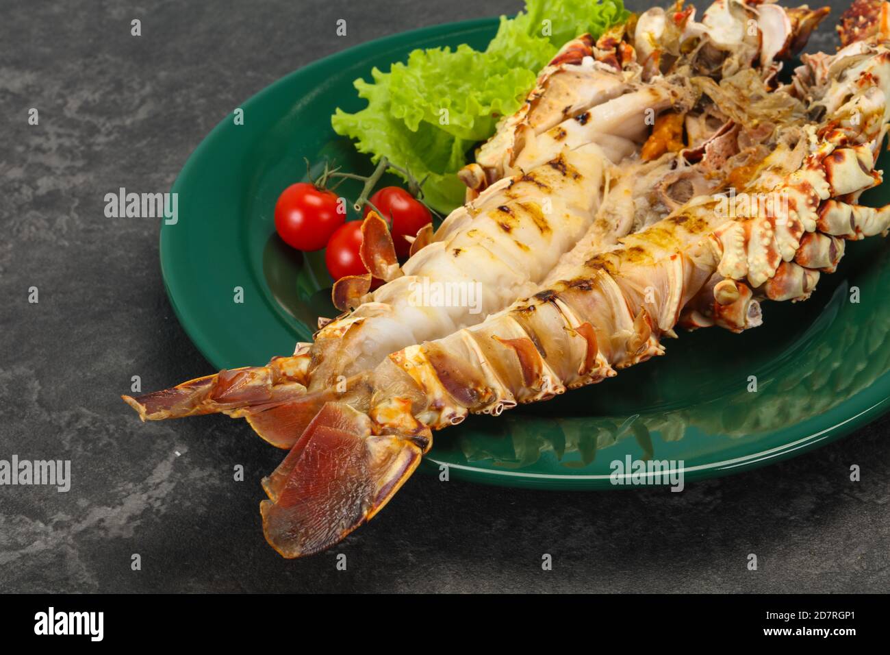 Grilled crayfish in the plate served salad Stock Photo - Alamy