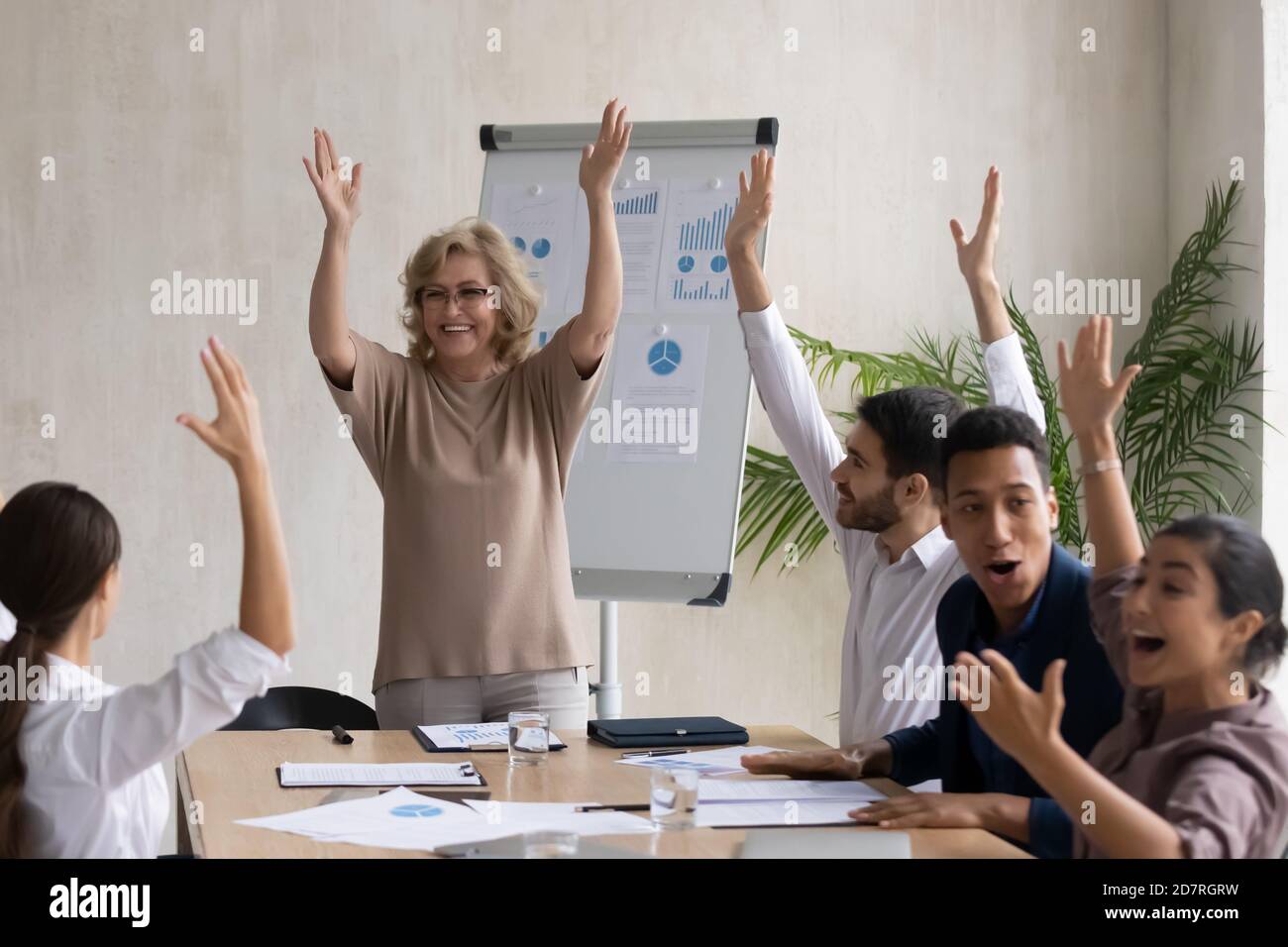 Excited diverse businesspeople take part in training in office Stock ...