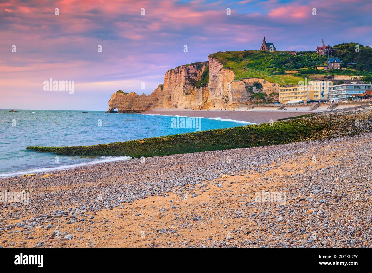 Amazing gravel beach after tide and spectacular waterfront cliffs in ...