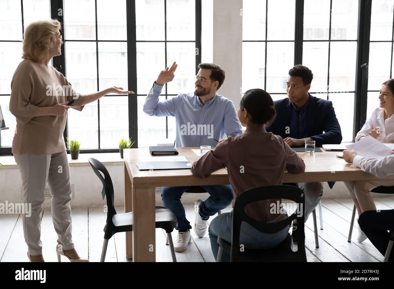 Employee raise hand ask hi-res stock photography and images - Alamy