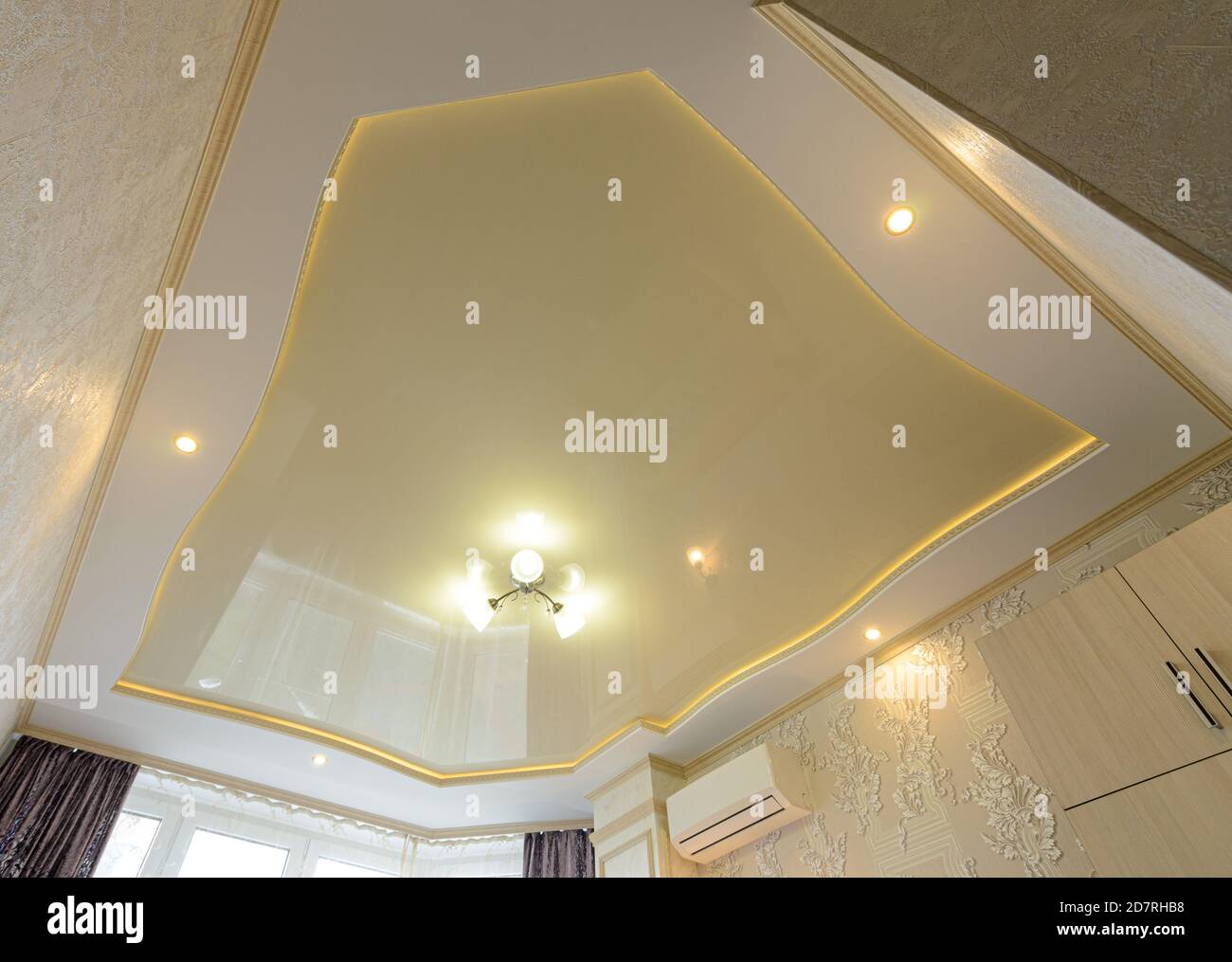 Warm two-level ceiling in the bedroom interior Stock Photo - Alamy