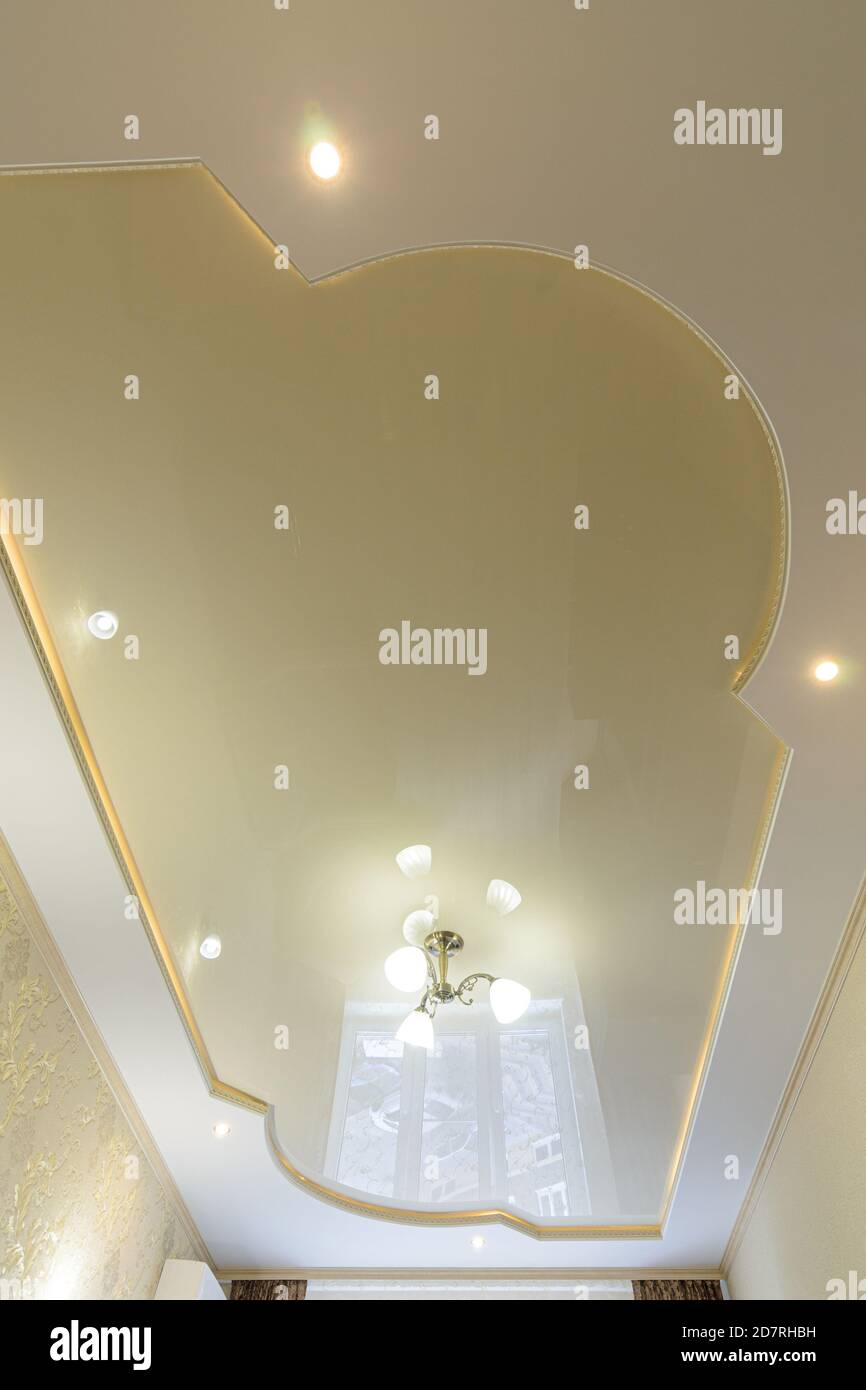 Rich multi-level stretch ceiling with original shape Stock Photo - Alamy