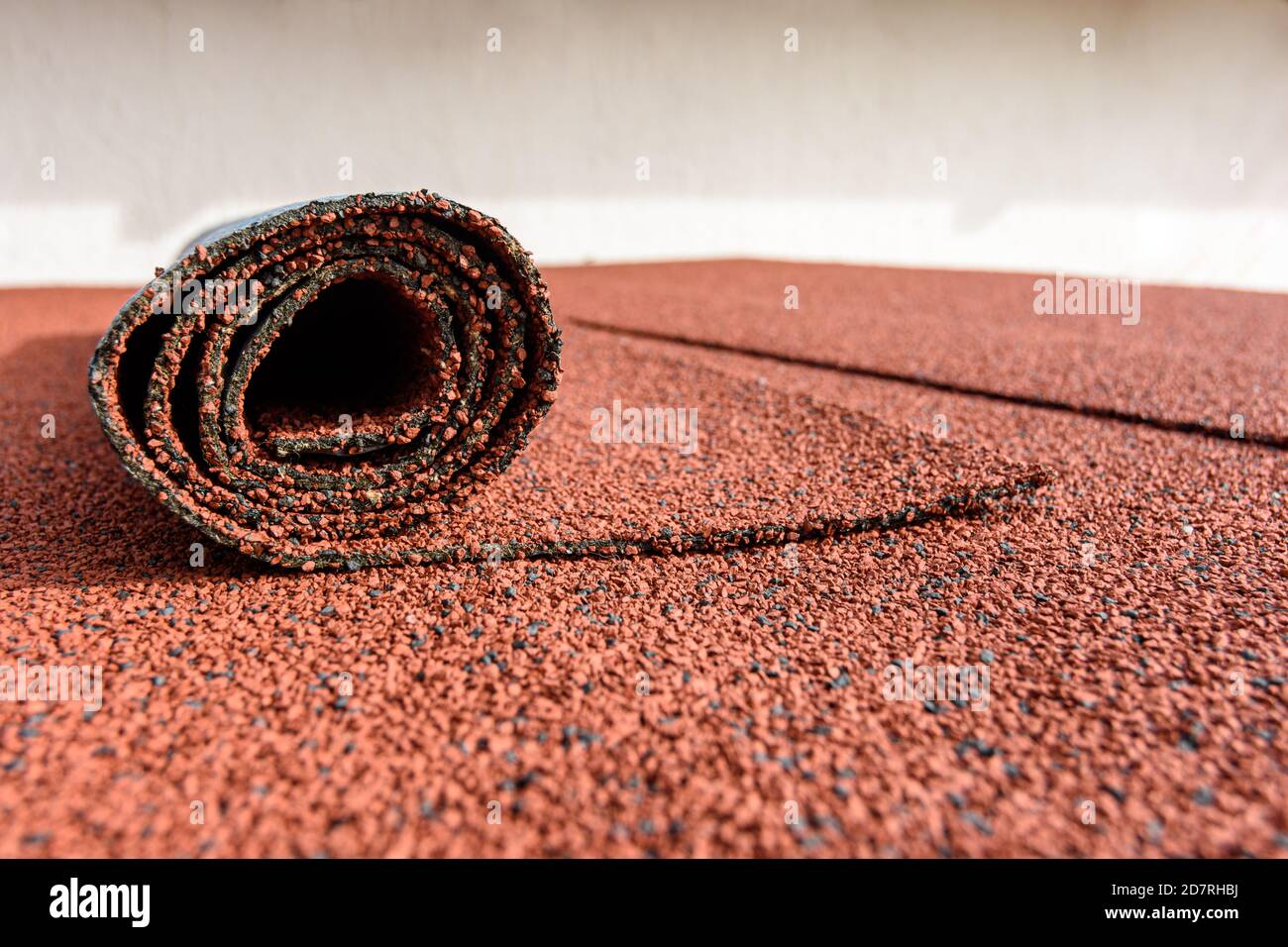 Bitumen roll shingles are laid on the roof on which a roll of shingles ...