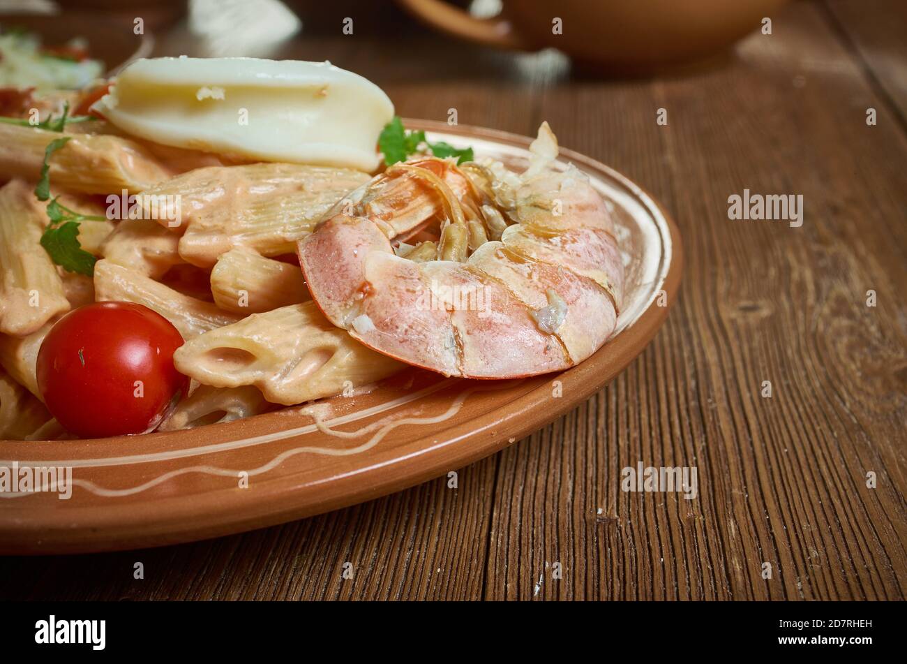 Seafood Alfredo Paella - Spanish seafood paella with melting cheese ...