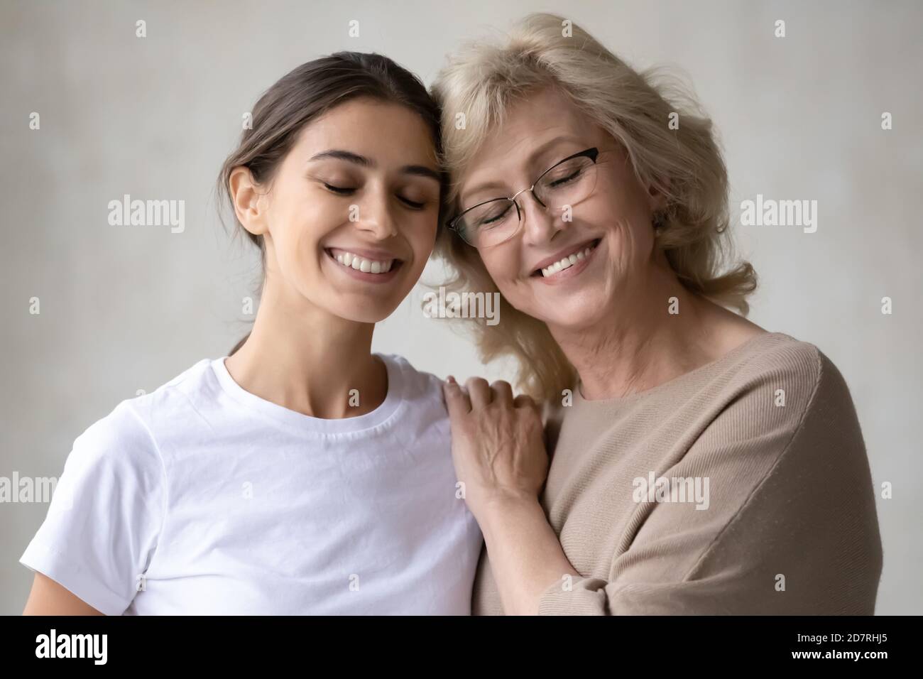 Close up of happy mature mom and grownup daughter hugging Stock Photo - Alamy