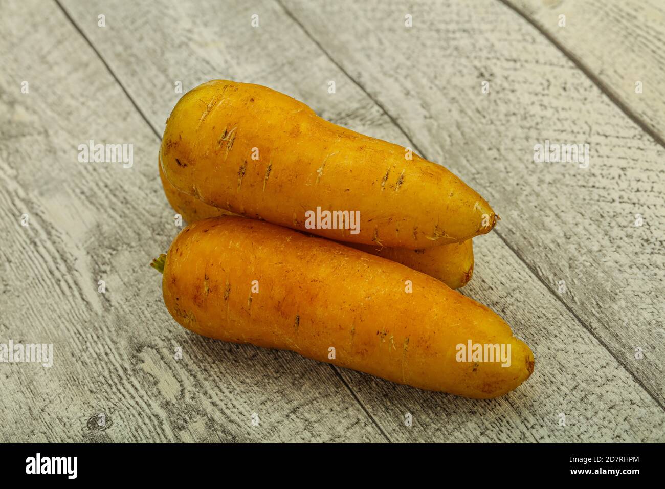 Natural vegan food - Raw Yellow carrot Stock Photo - Alamy