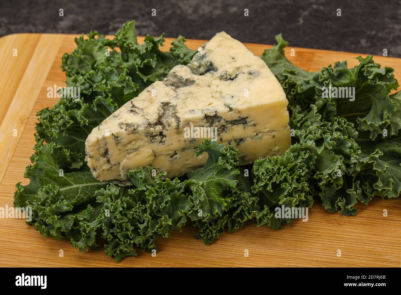 Dairy Blue cheese triangle with mold Stock Photo - Alamy