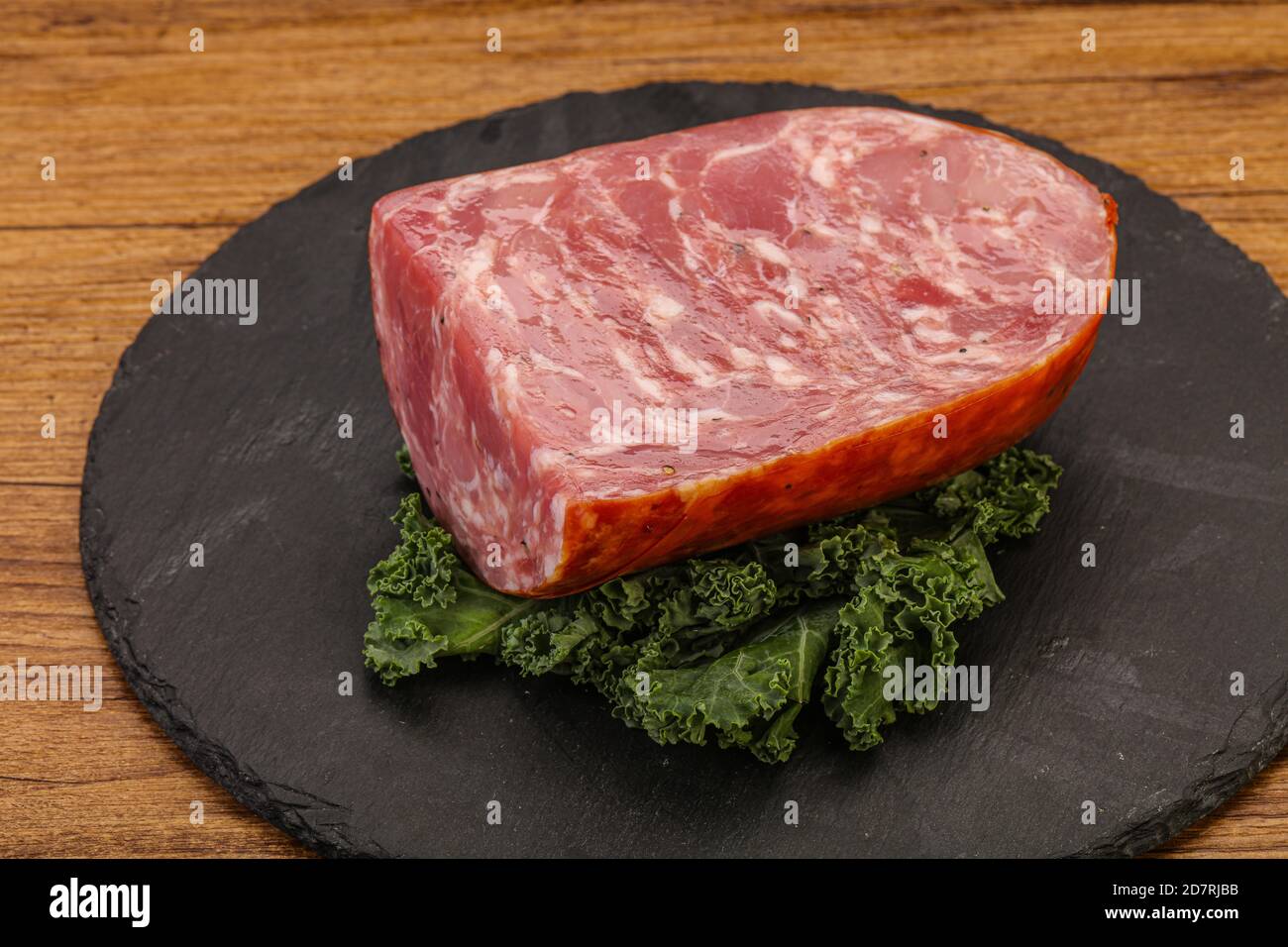 Tasty Beef ham piece over board Stock Photo - Alamy