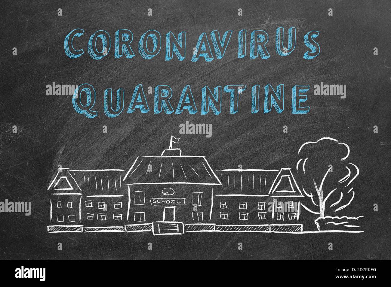 School building and lettering coronavirus quarantine on blackboard ...