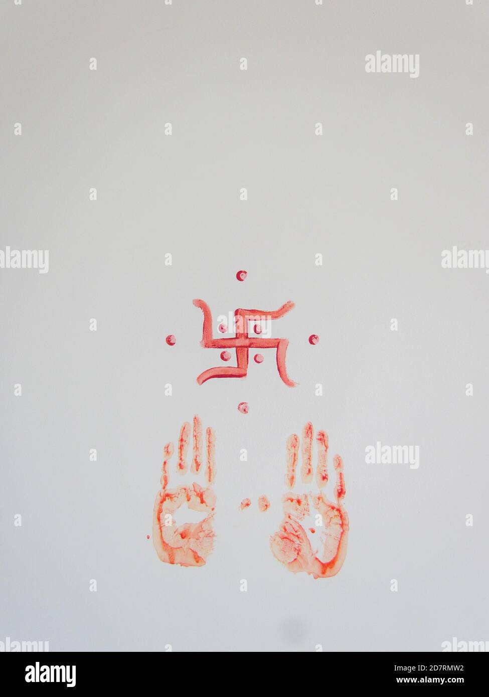 Design of palms and swastika considered auspicious in Hindu rituals ...