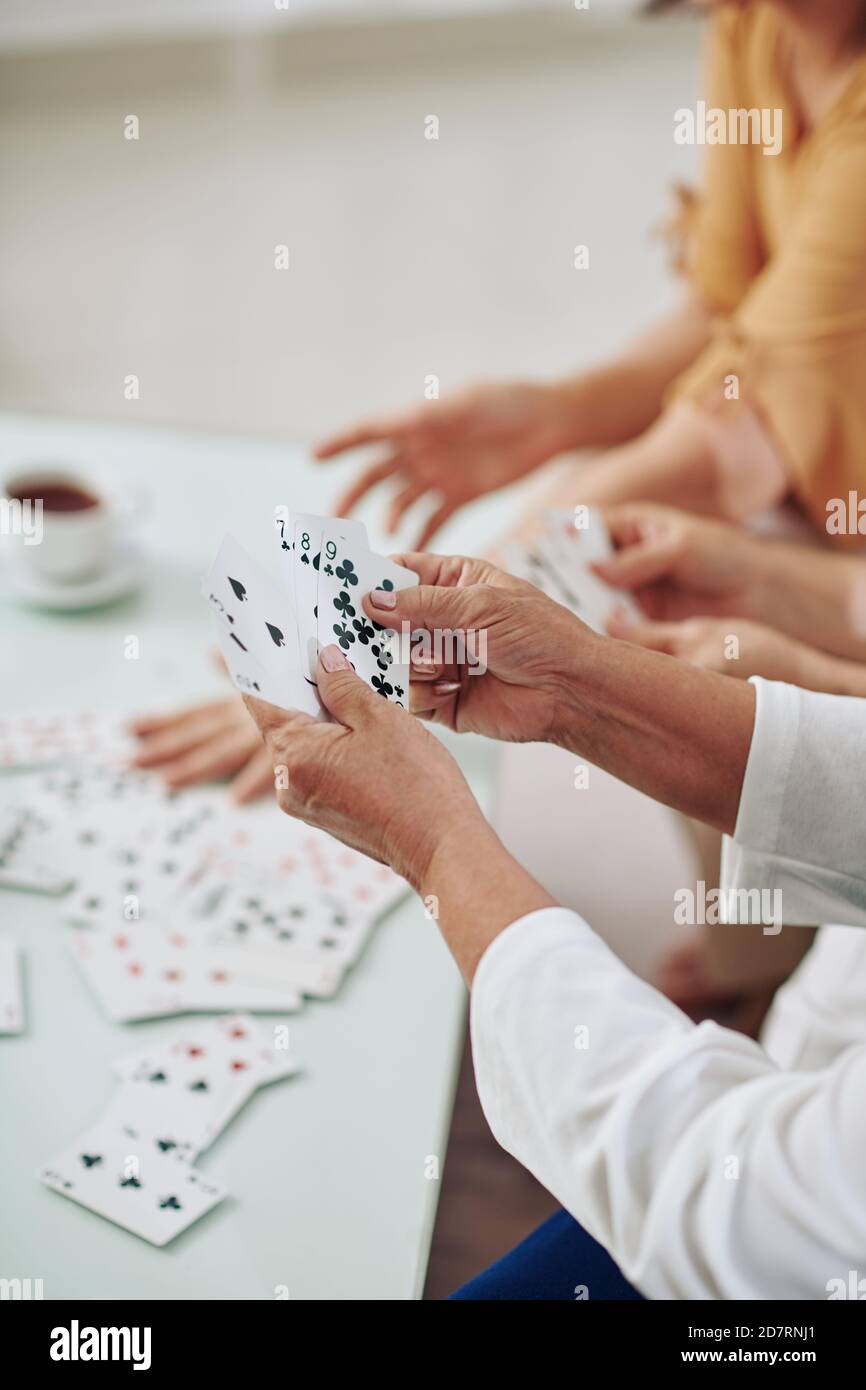 Senior women playing cards Stock Photo - Alamy
