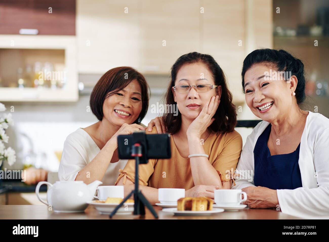 Elderly women talking selfie Stock Photo - Alamy