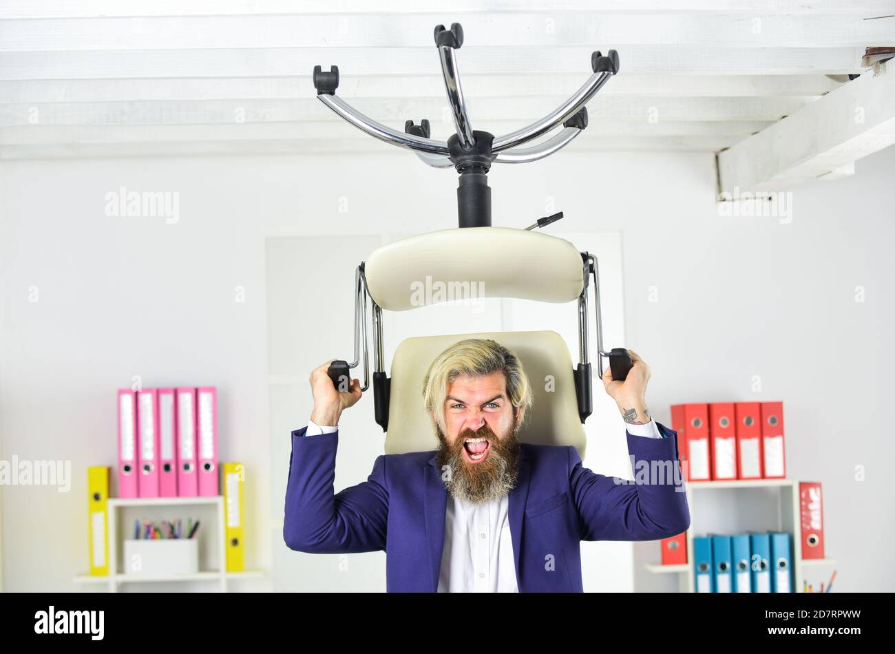 Throw out chair. Businessman standing in office hold chair. Business ...