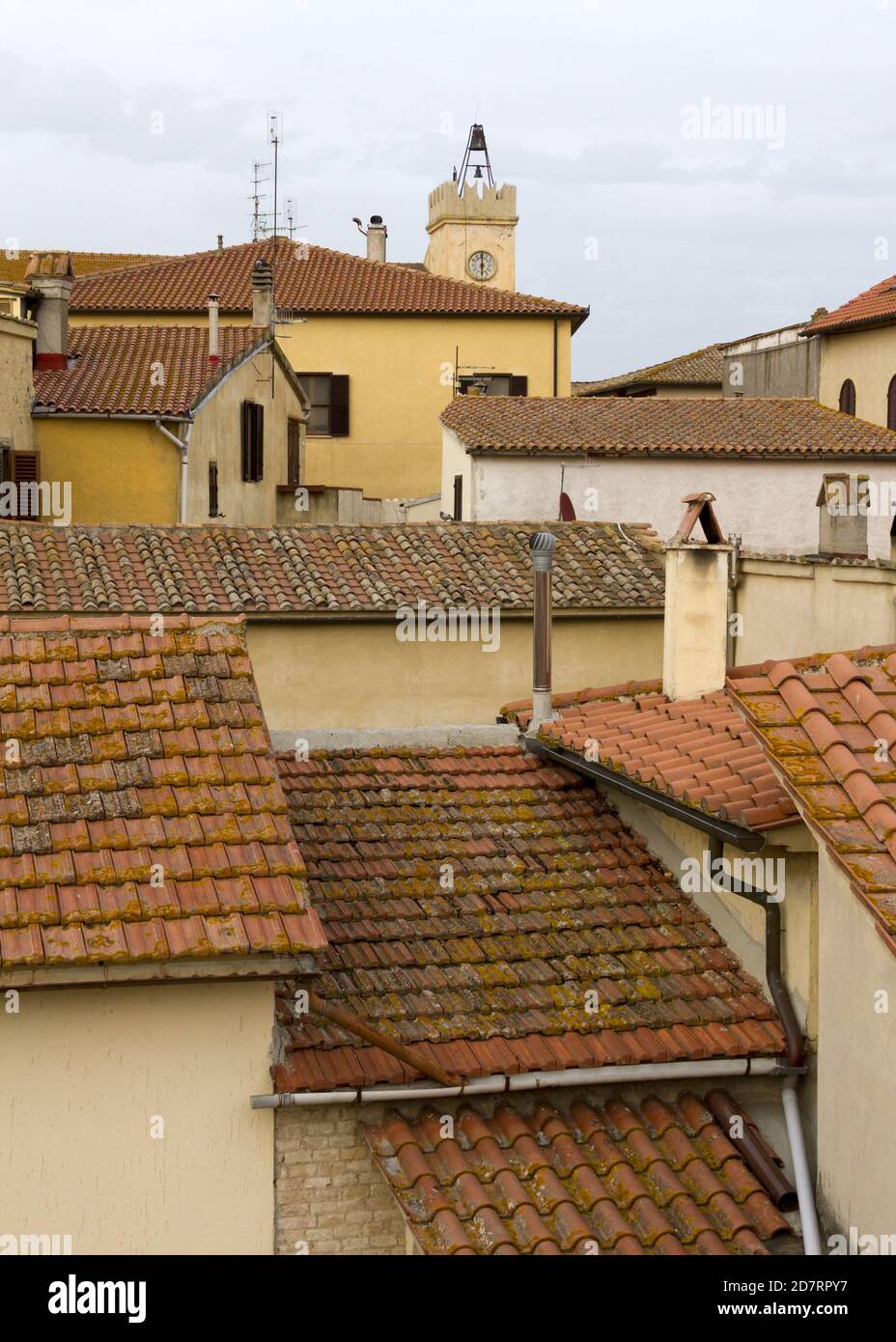 Vertical shot of old weathered red roofs of Magliano in Toscana, Italy ...