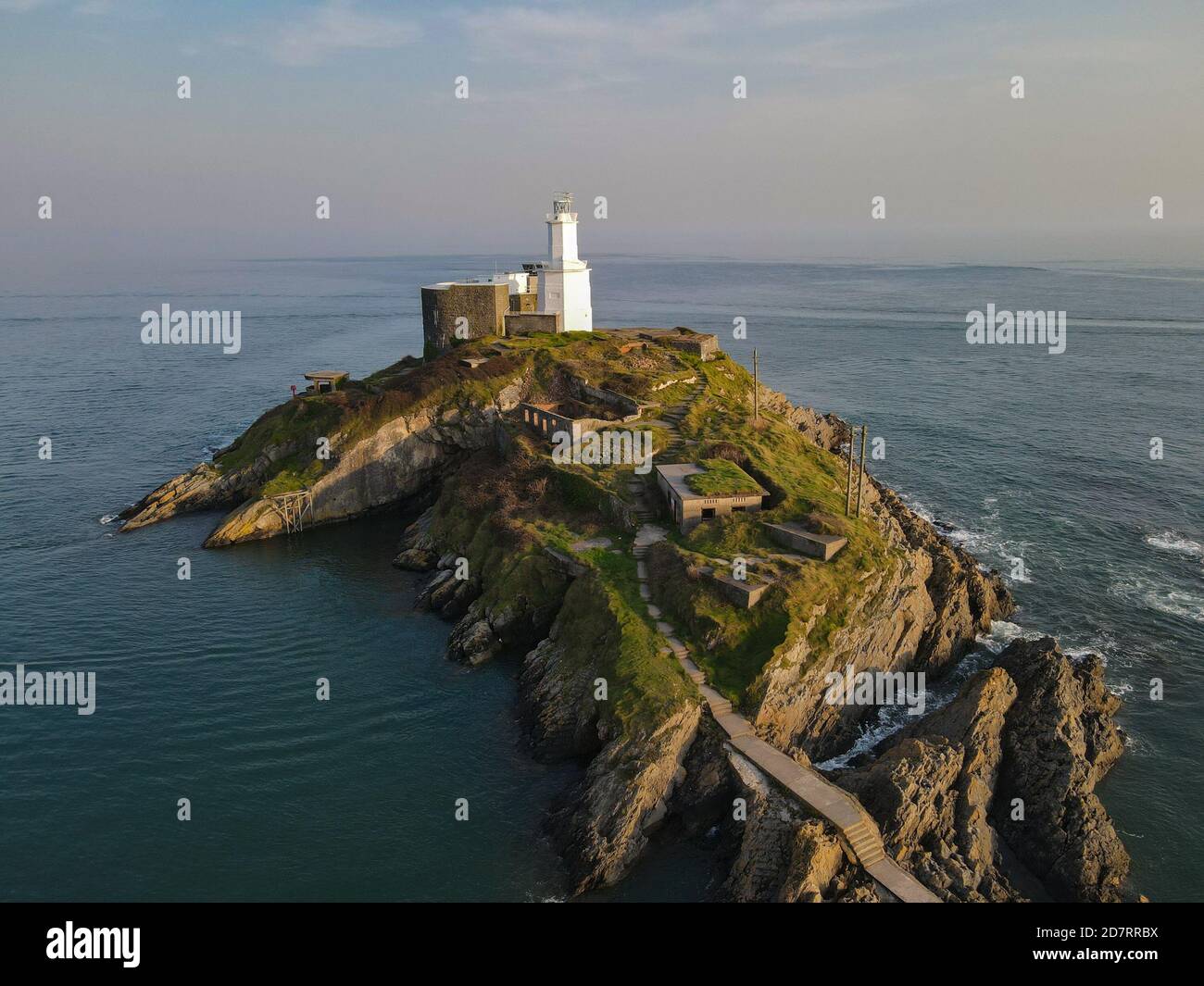The Mumbles Lighthouse sits on its own island off the Gower Peninsula ...