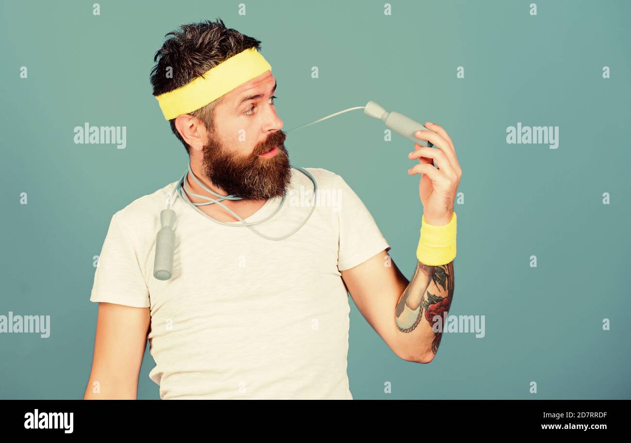 Sportsman training blue background. Athlete training with sport ...