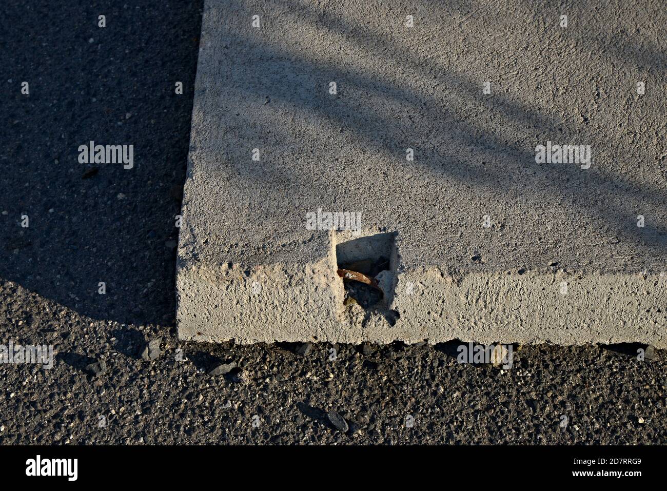 Close-up view of a road concrete panel. End of the road. Transition ...