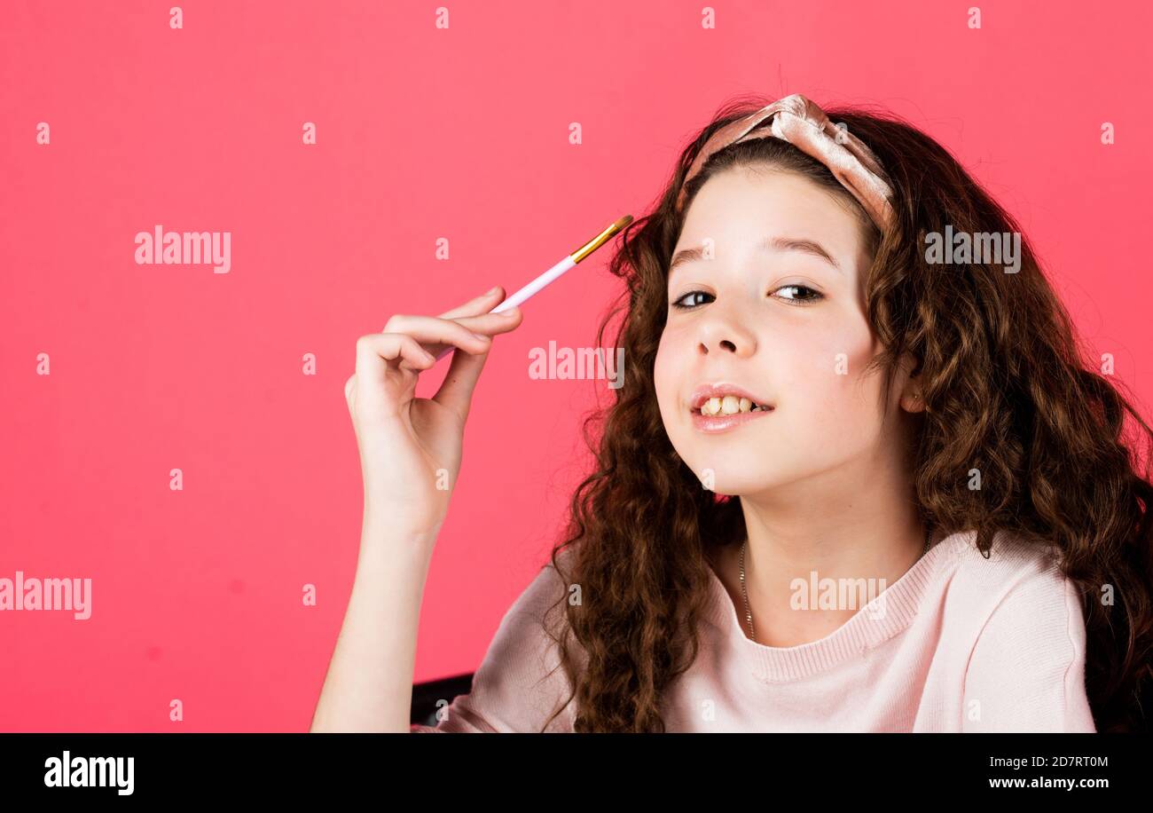 happy girl at hairdresser. childhood happiness. retro kid put on makeup ...