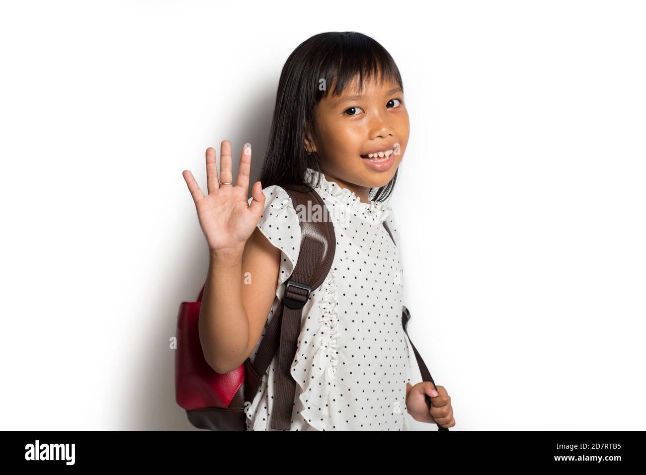 Asian student wearing backpack outdoors Stock Photo - Alamy