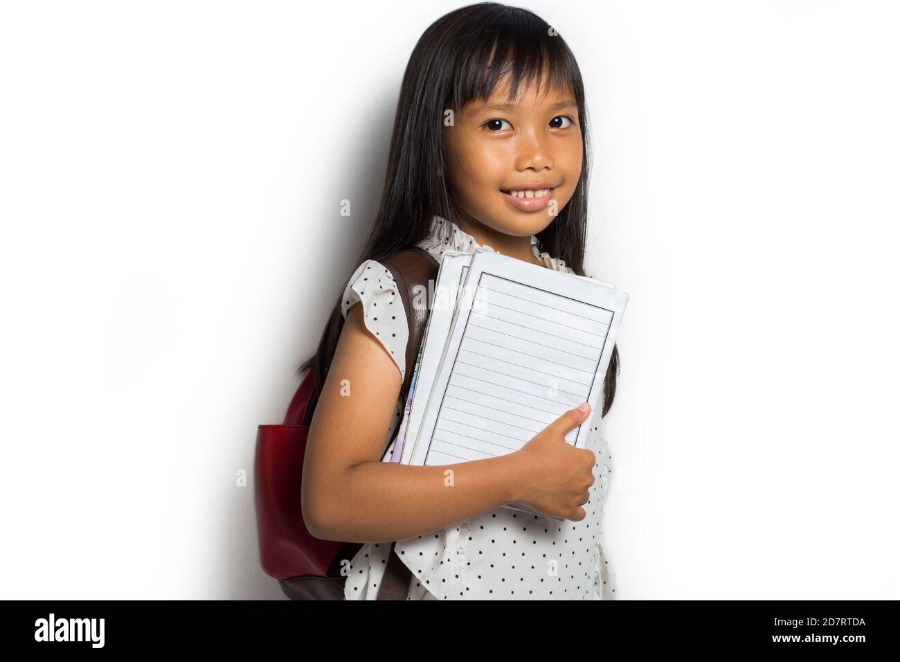 Asian student wearing backpack outdoors Stock Photo - Alamy