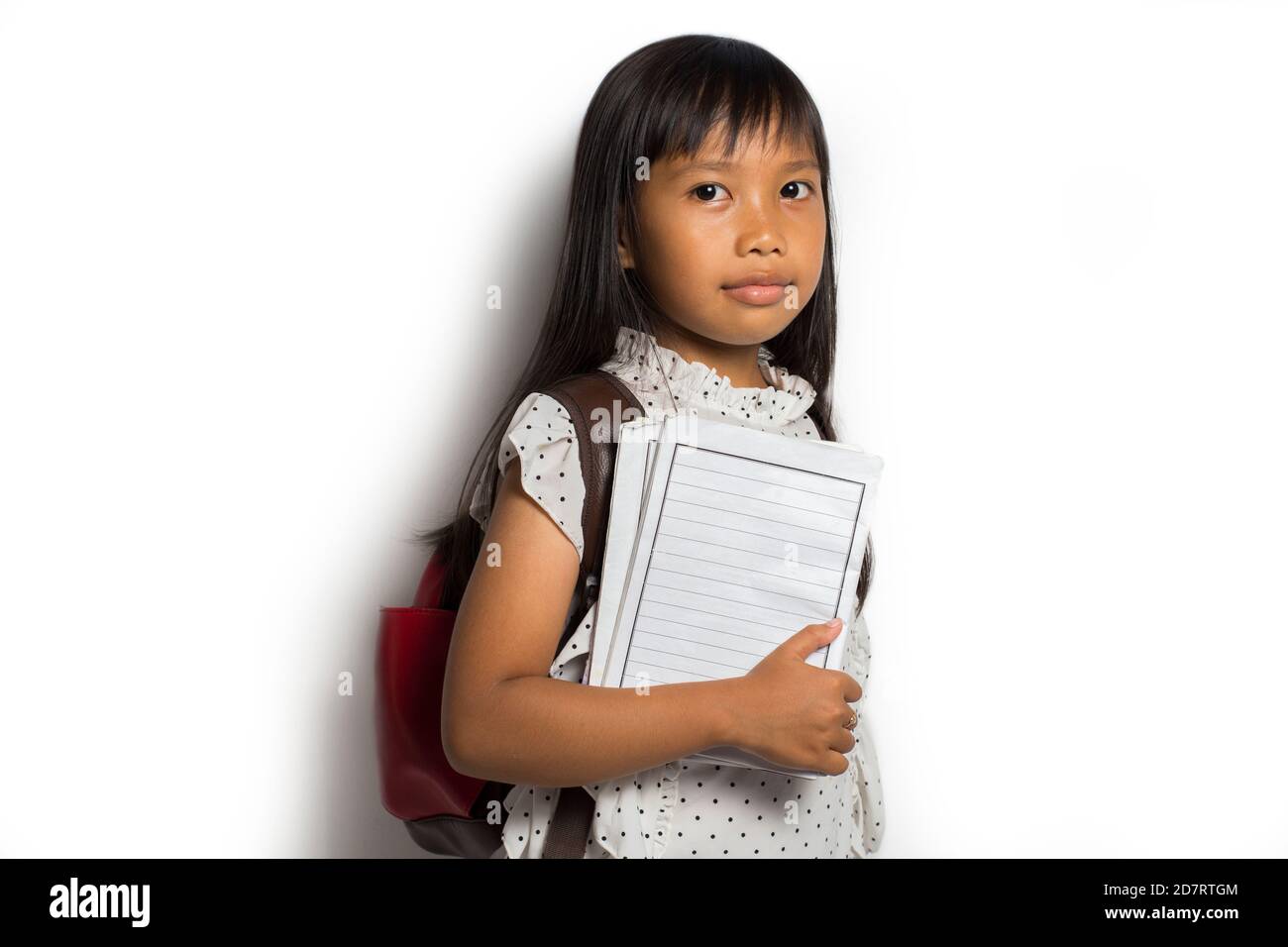 Asian student wearing backpack outdoors Stock Photo - Alamy