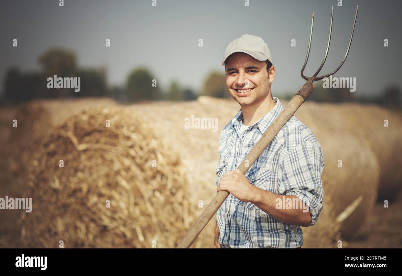 Farmer with a pitchfork hi-res stock photography and images - Alamy