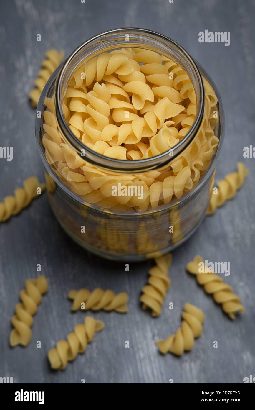 Glass jar with pasta placed on a tabletop. Eco friendly concept Stock ...