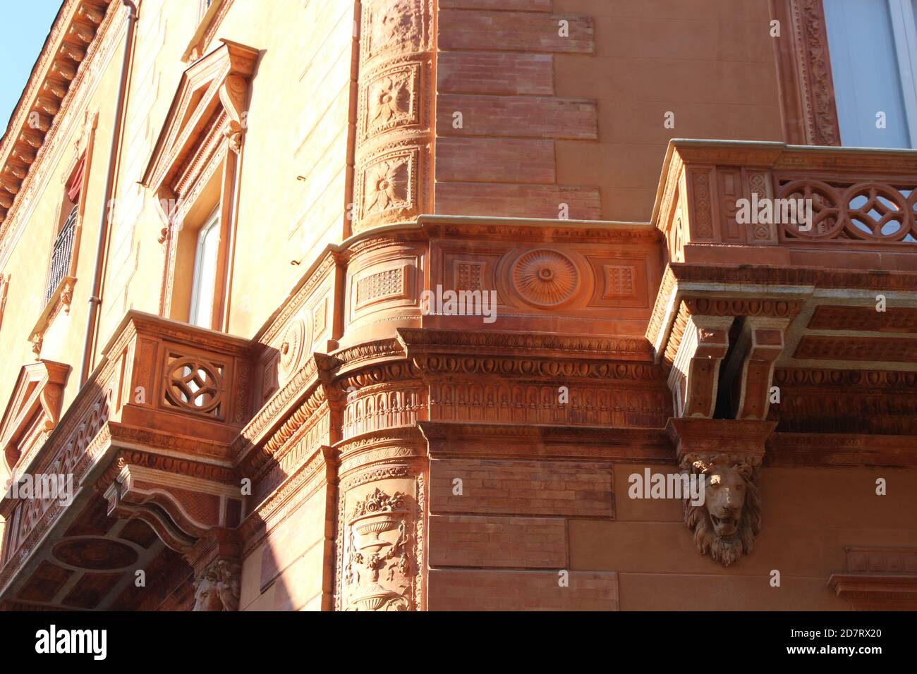 Beautiful building decorated with carved stone symbol Stock Photo - Alamy
