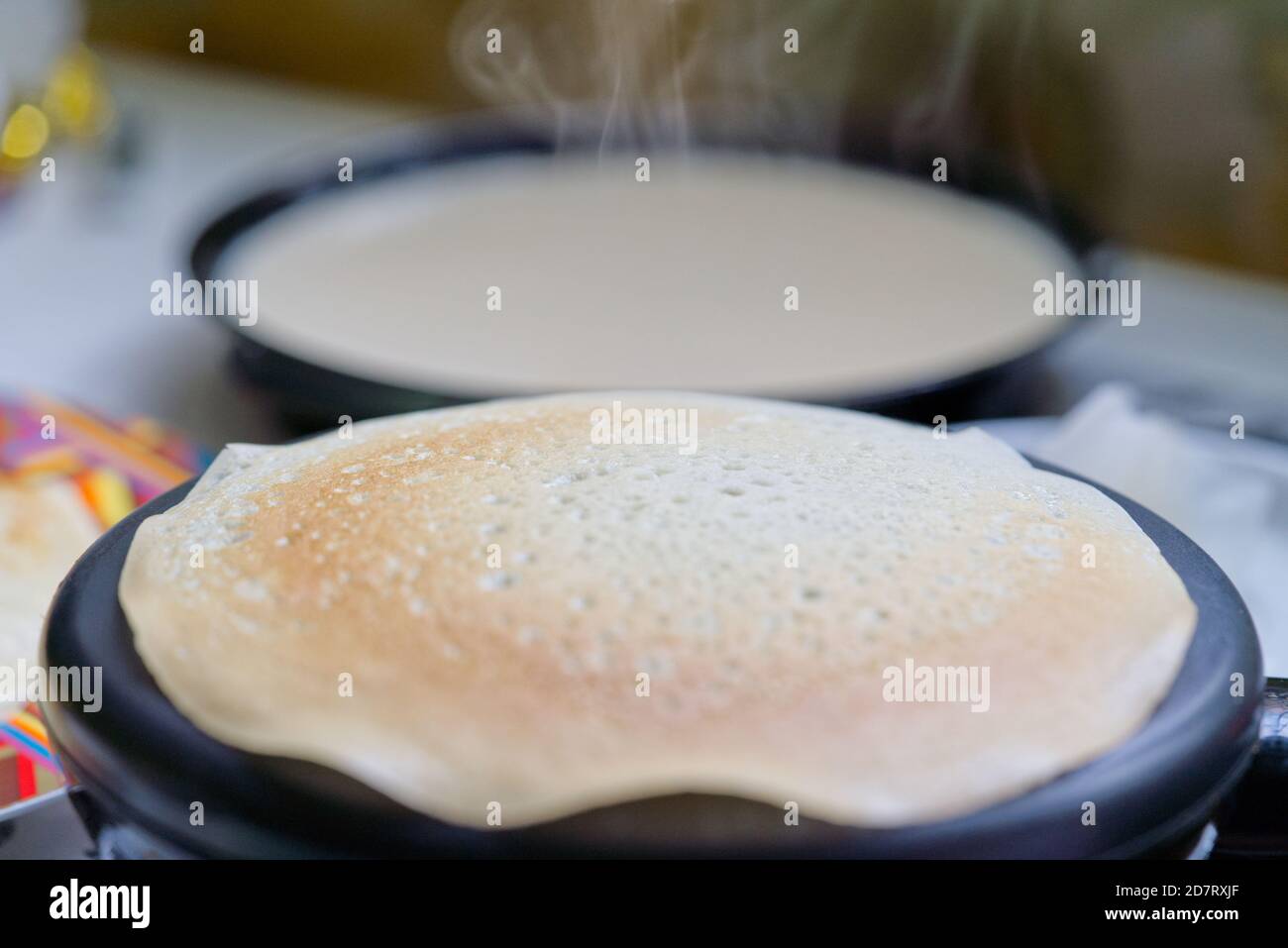 big round pancake on electric frying pan Stock Photo - Alamy