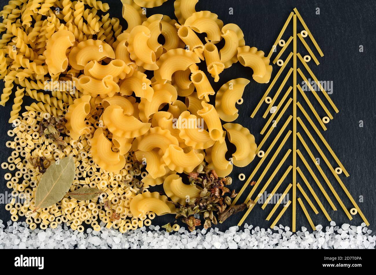 Christmas tree made with italian spaghetti with salt on a slate ...