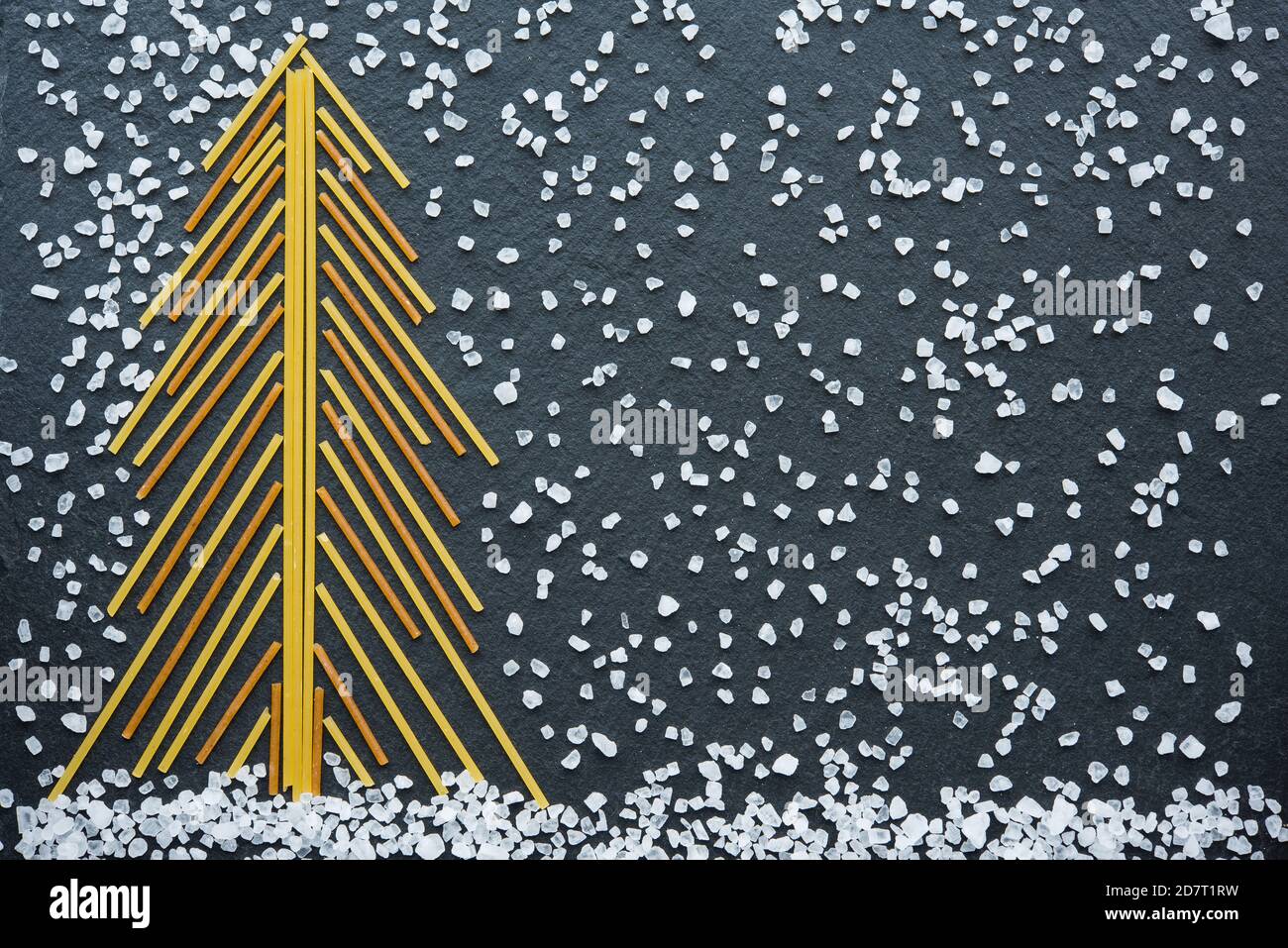 Christmas tree made with italian spaghetti with salt on a slate ...