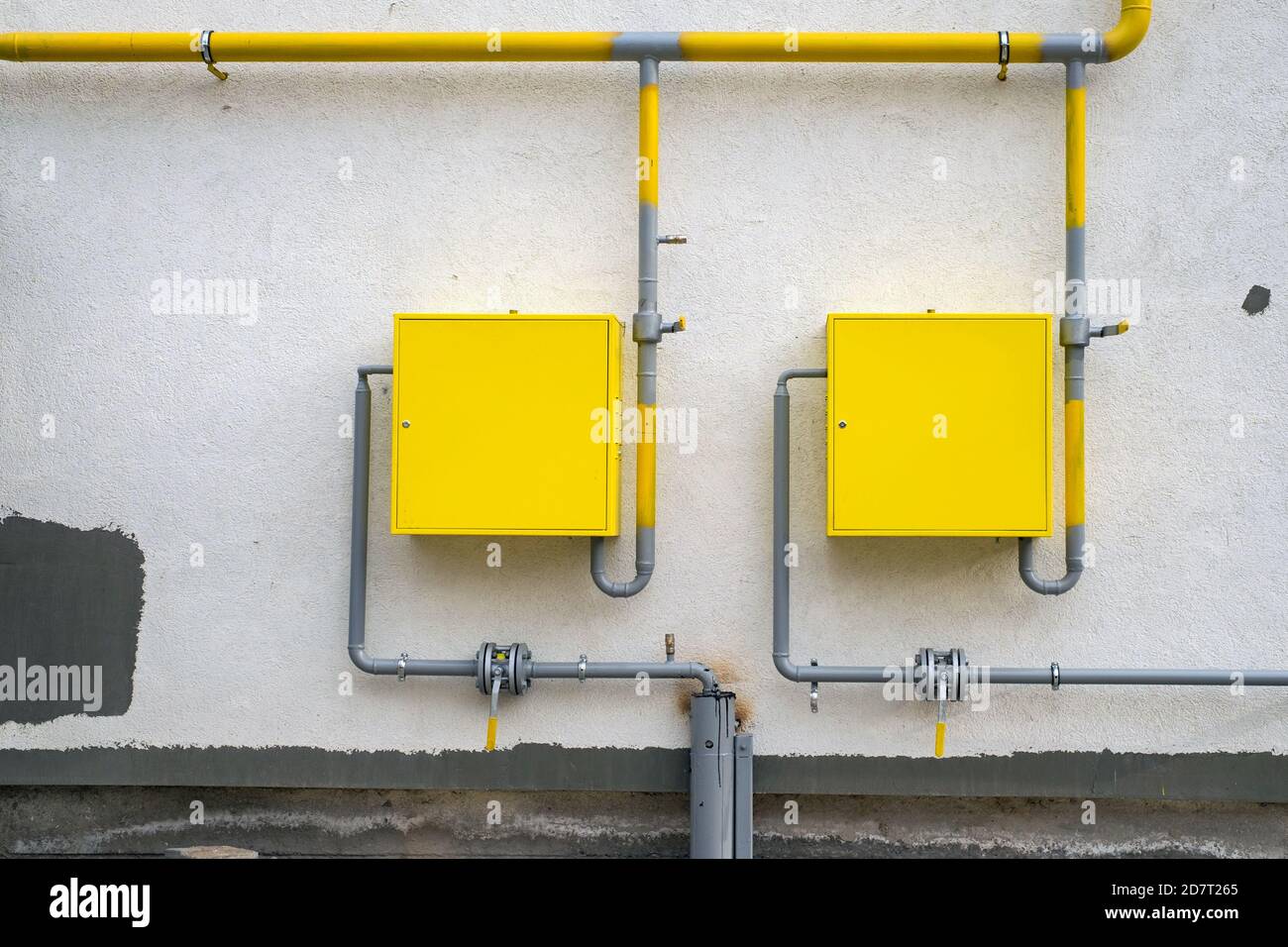 New yellow gas pipe distribution point in an apartment house Stock ...