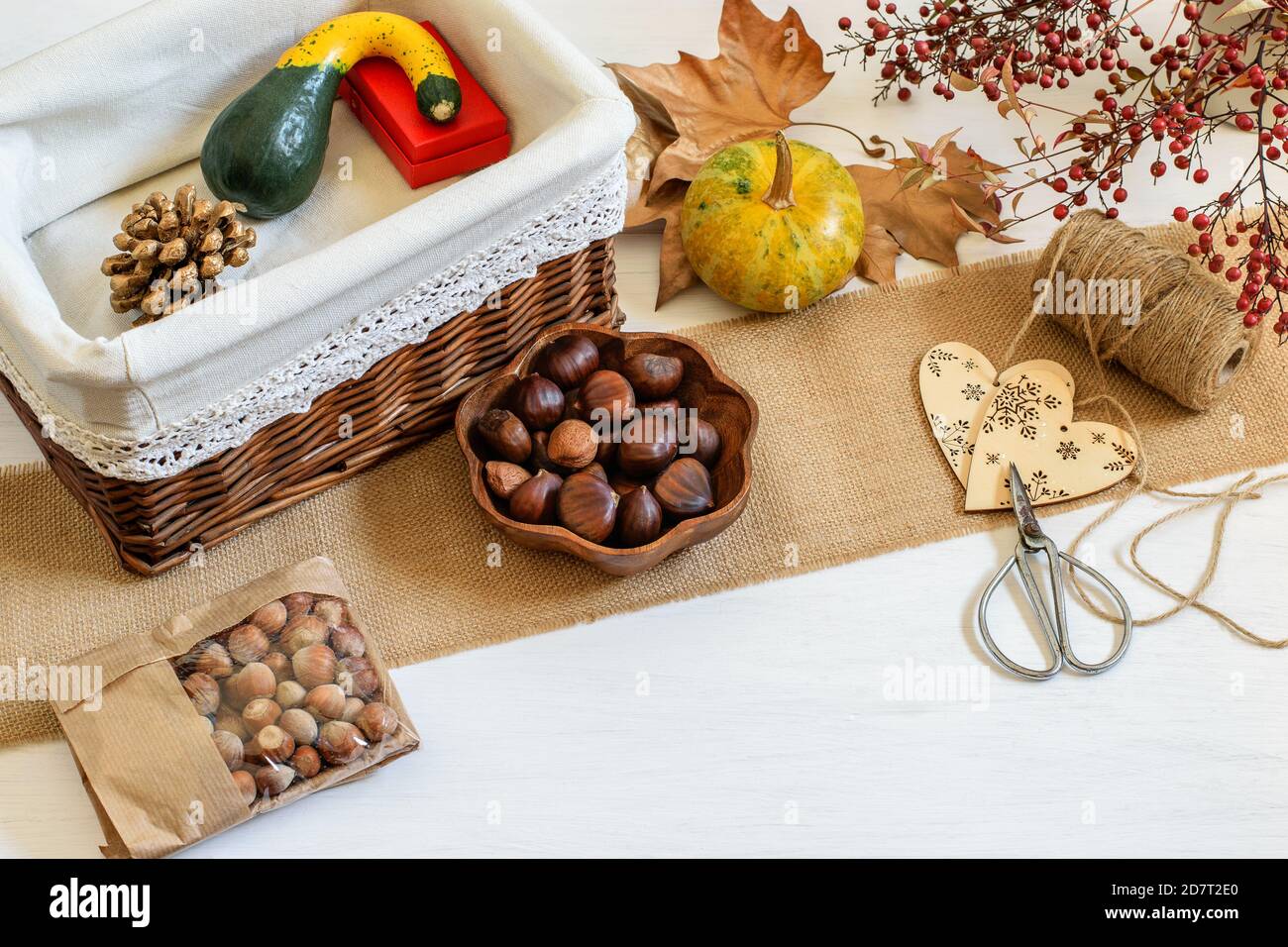 Halloween presents packing background. Decorative pumpkins, chestnuts ...