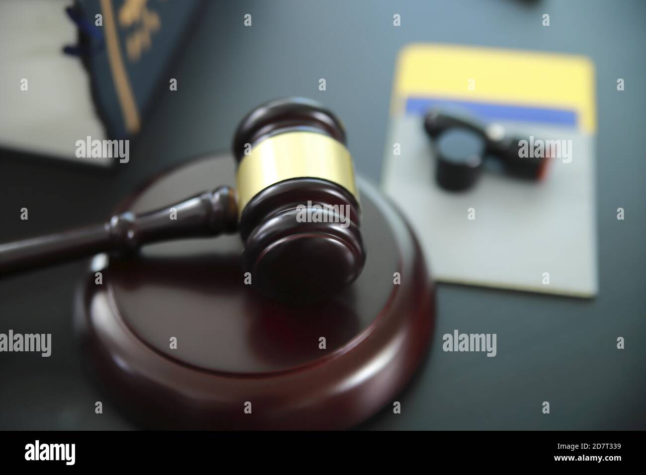 Gavel with bank book and stamp on desk Stock Photo - Alamy