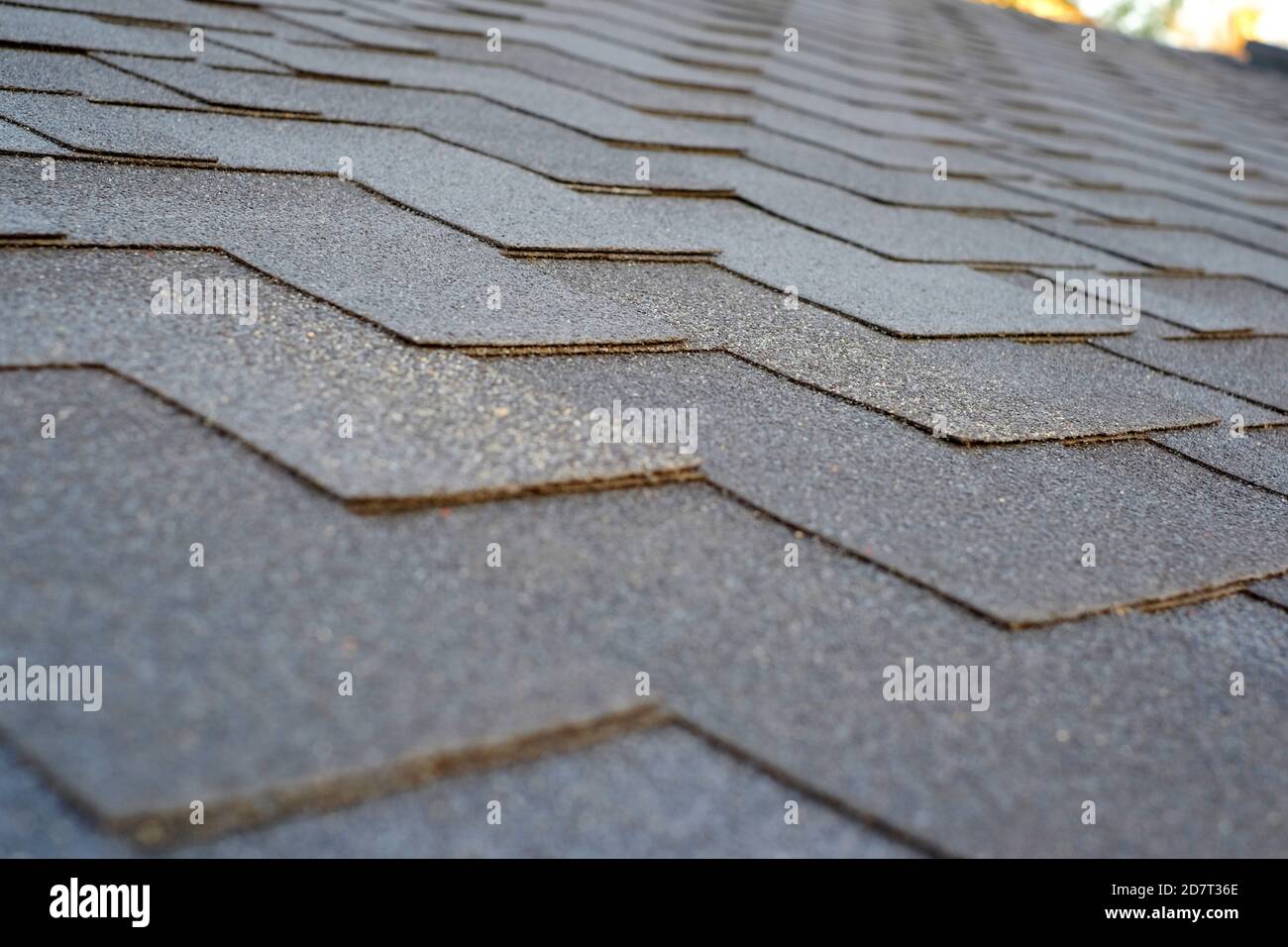 Close up view on asphalt roofing shingles Stock Photo - Alamy