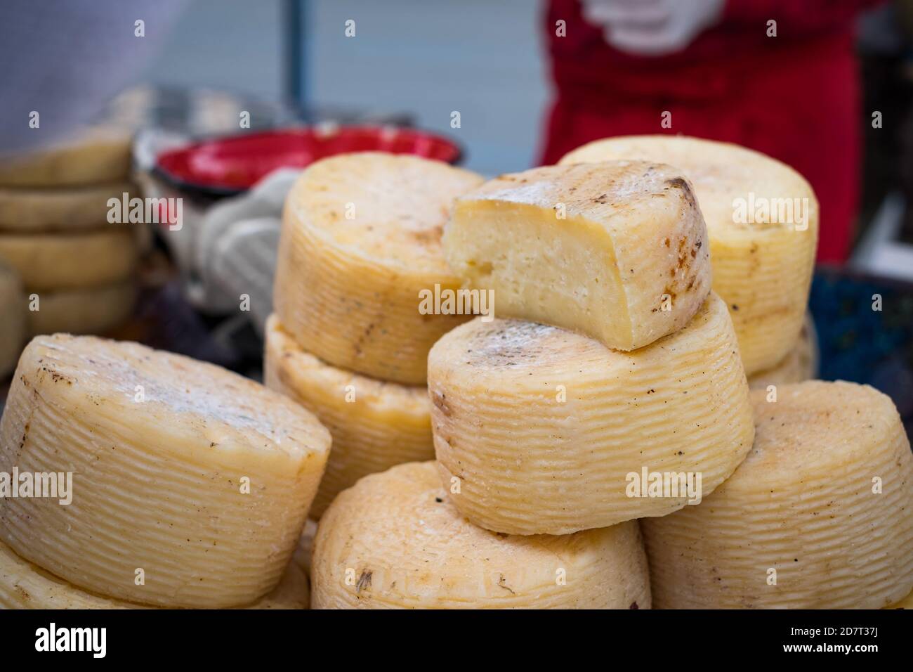 Homemade organic farm cheese at the street food fair Stock Photo - Alamy