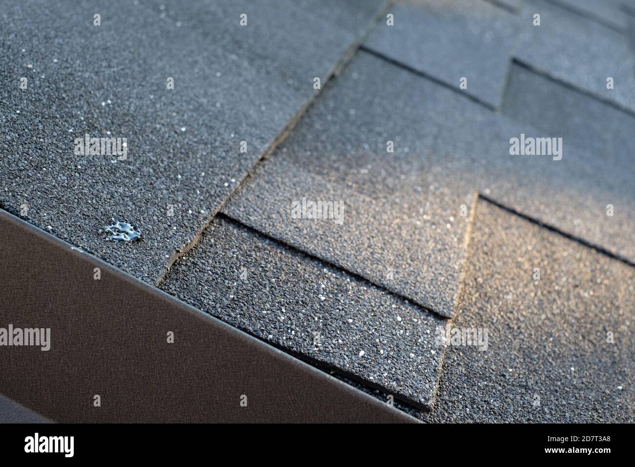 Close up view on corner roof made is asphalt roofing shingles Stock ...