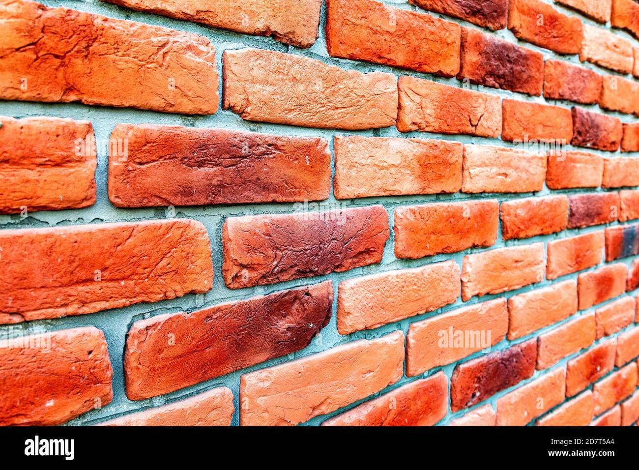 Weathered red brick wall as background. Bricks masonry. View from the ...
