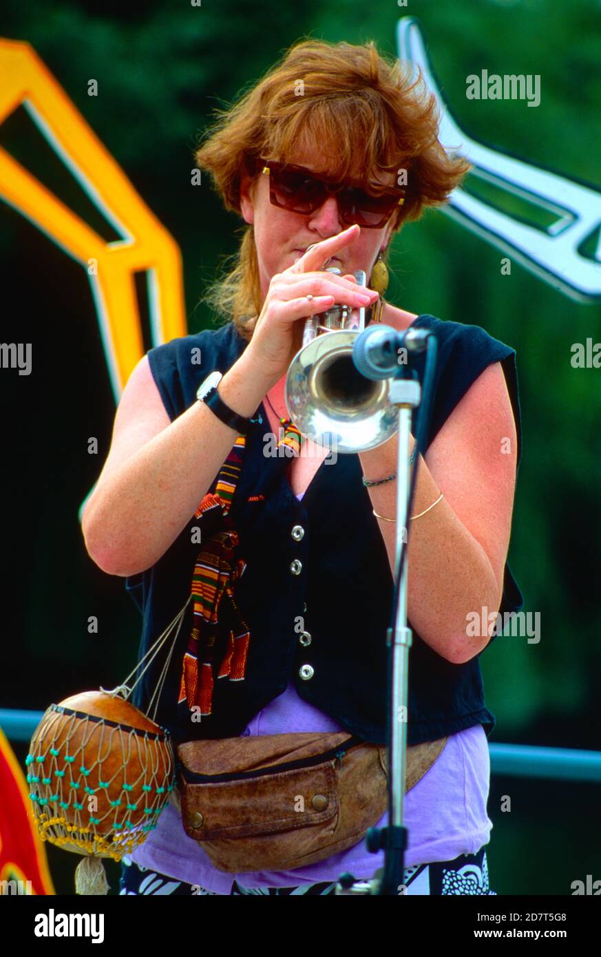 Woman blowing trumpet hi-res stock photography and images - Alamy