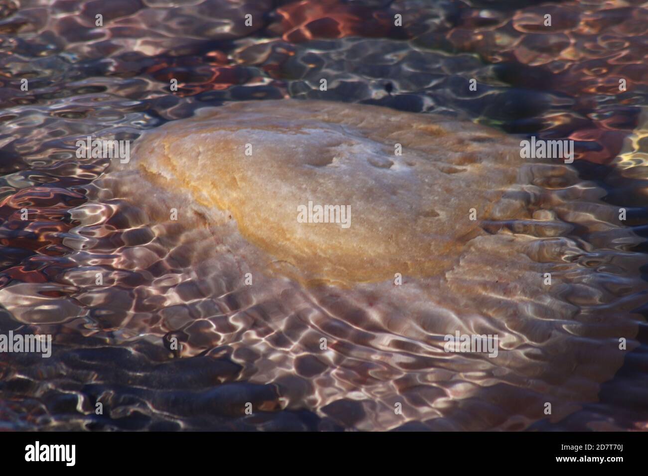 Pebbles under water Stock Photo - Alamy