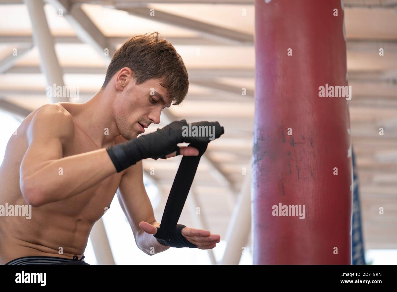 Muay Thai men fighter wearing hand wraps Stock Photo - Alamy