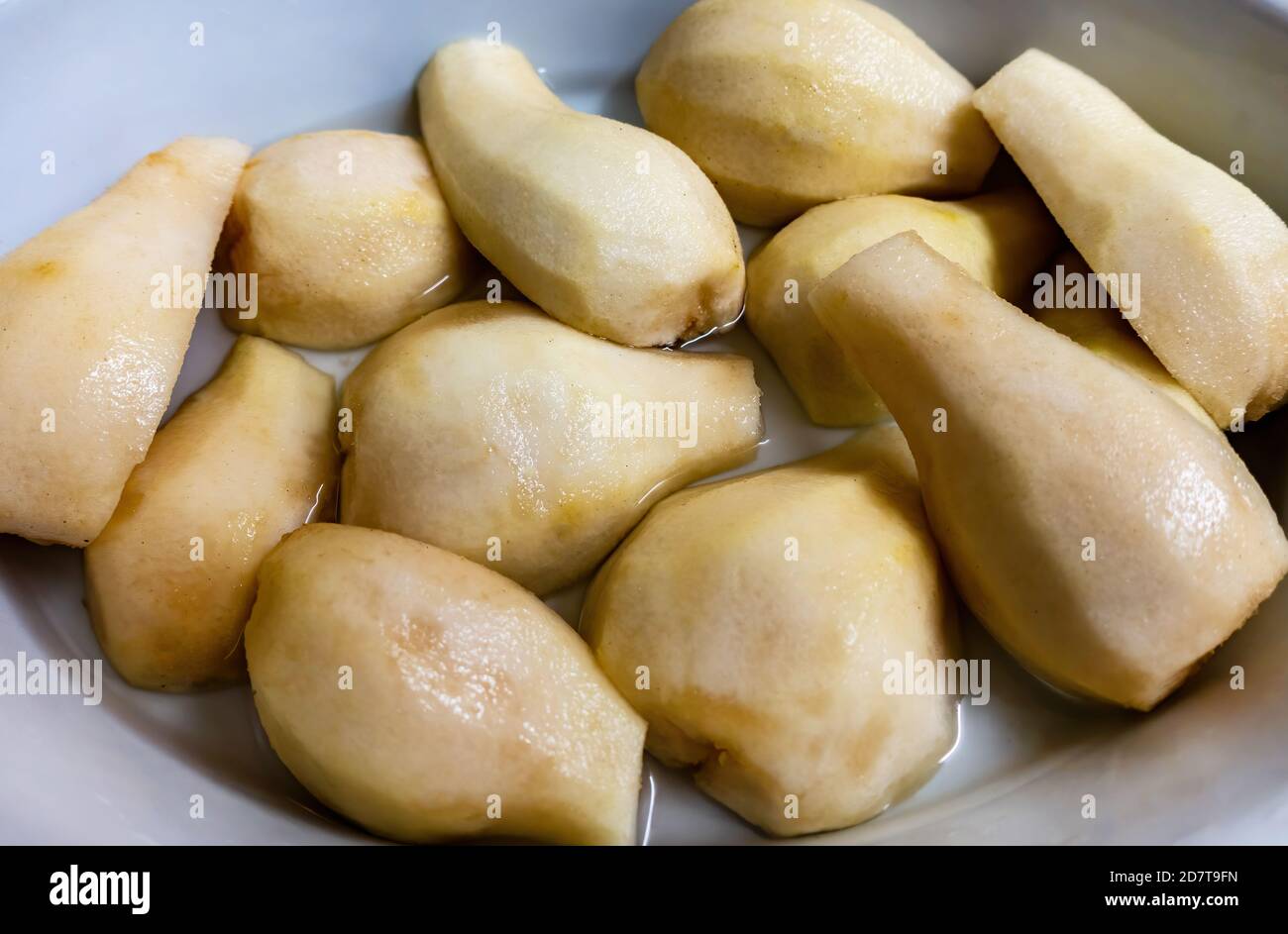 Halves poached pear hi-res stock photography and images - Alamy